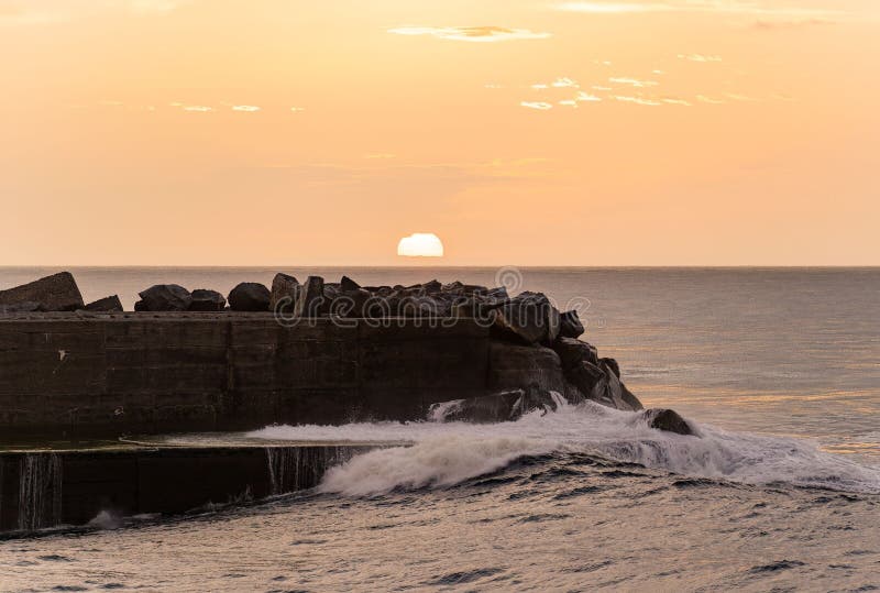 Dramatic Powerful Ocean Waves Crashing Against a Jetty Break Wall in ...