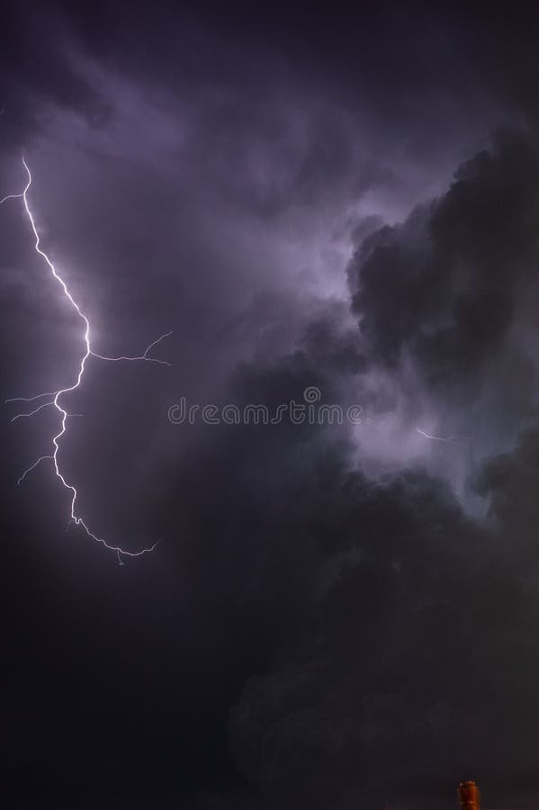 Dramatic Purple Lightning Bolt in the Dark Night Sky Stock Image ...