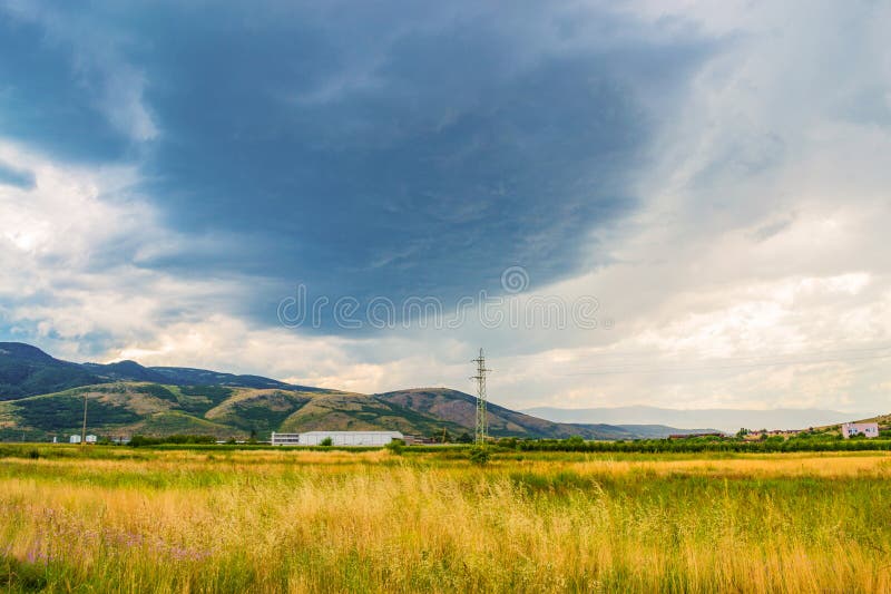 Dramatic Rain Clouds in the Sky and the Approaching Rain Summer Fields ...