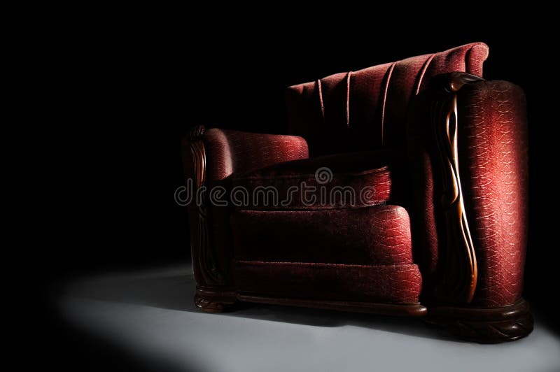 Dramatic Red Arm Chair on Black Background Stock Photo - Image of ...