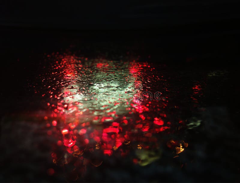 Dramatic Red and Green Raindrops on Rainy Surface Background Stock ...