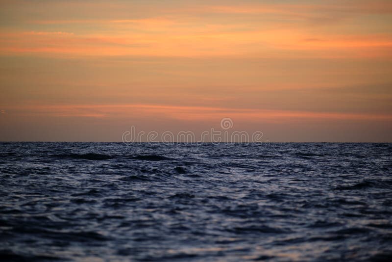 Dramatic Red Ocean Waves at Sunset with Soft Evening Sea Dark Water ...