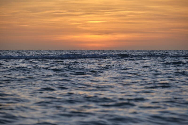 Dramatic Red Ocean Waves at Sunset with Soft Evening Sea Dark Water ...