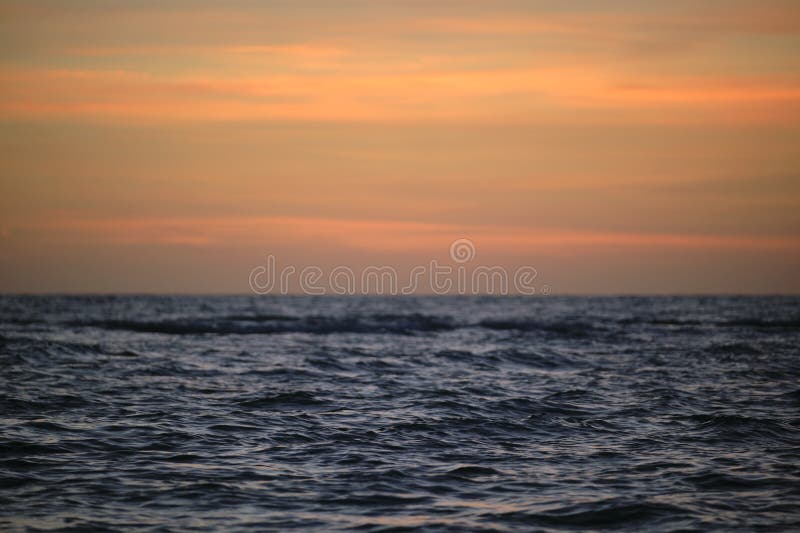 Dramatic Red Ocean Waves at Sunset with Soft Evening Sea Dark Water ...
