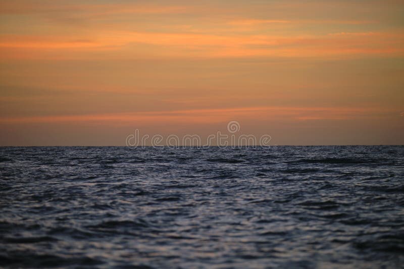Dramatic Red Ocean Waves at Sunset with Soft Evening Sea Dark Water ...