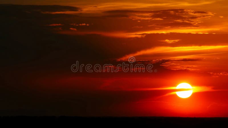 Dramatic Red Sunrise on Dark Cloudy Sky Stock Image - Image of shiny ...