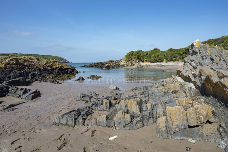 Dramatic Rock Formations on Angle Bay Beach Stock Photo - Image of ...