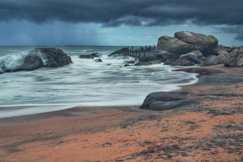 Dramatic Rock Formations, Dark Cloud and Tides Stock Image - Image of ...