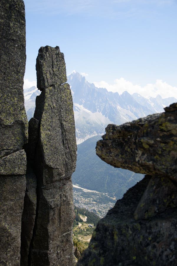 Dramatic Rock Formations Frame a View of Mont Blanc and Chamonix during ...