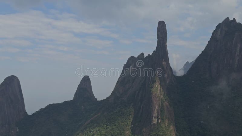 Dramatic Rock Formations Surrounded by Misty Jungle Mountains Stock ...