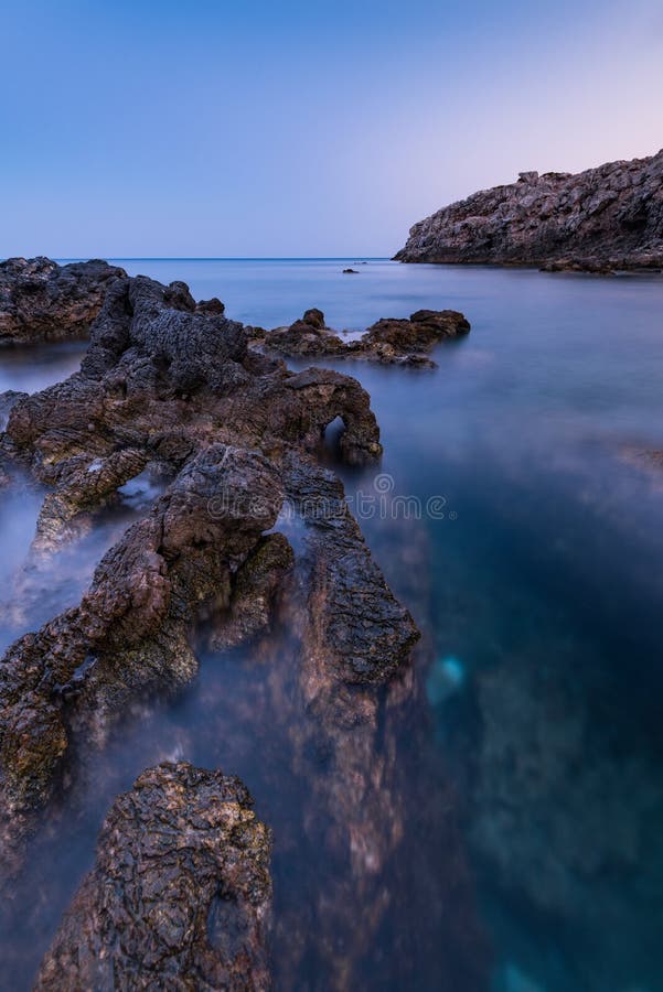 Dramatic Rocks in Mediterranean Sea, Long Exposure Sunset,Greece Stock ...