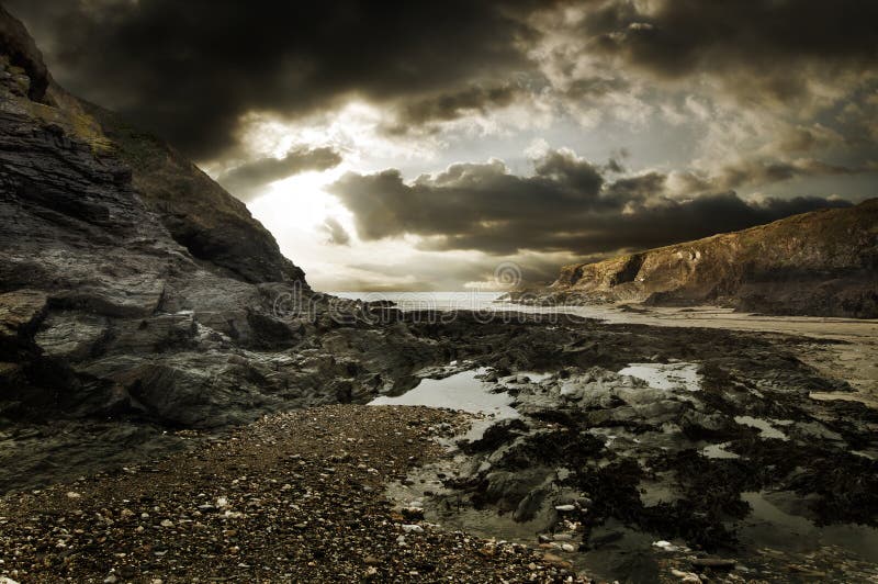 Dramatic Rocky Beach Landscape Stock Photo - Image of surf, cliffs ...
