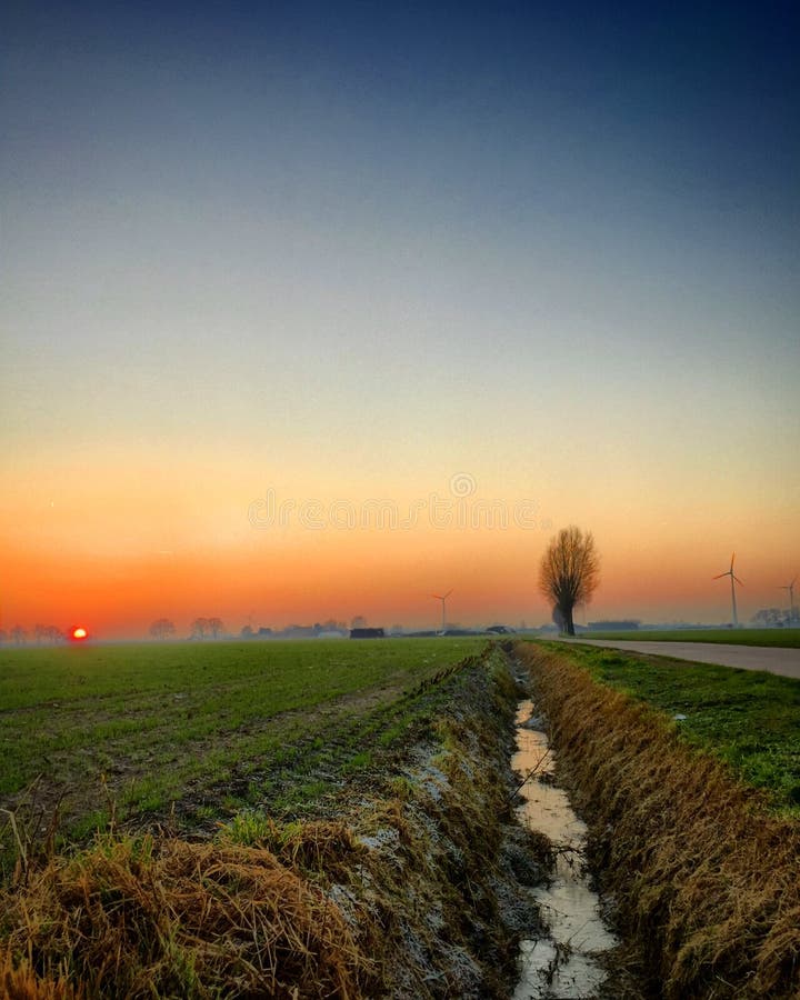 Dramatic rural sunset stock image. Image of beauty, horizon - 83521367