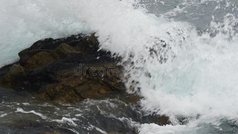 Powerful Sea Wave Crashing Against Rock in Stormy Weather Stock Image ...