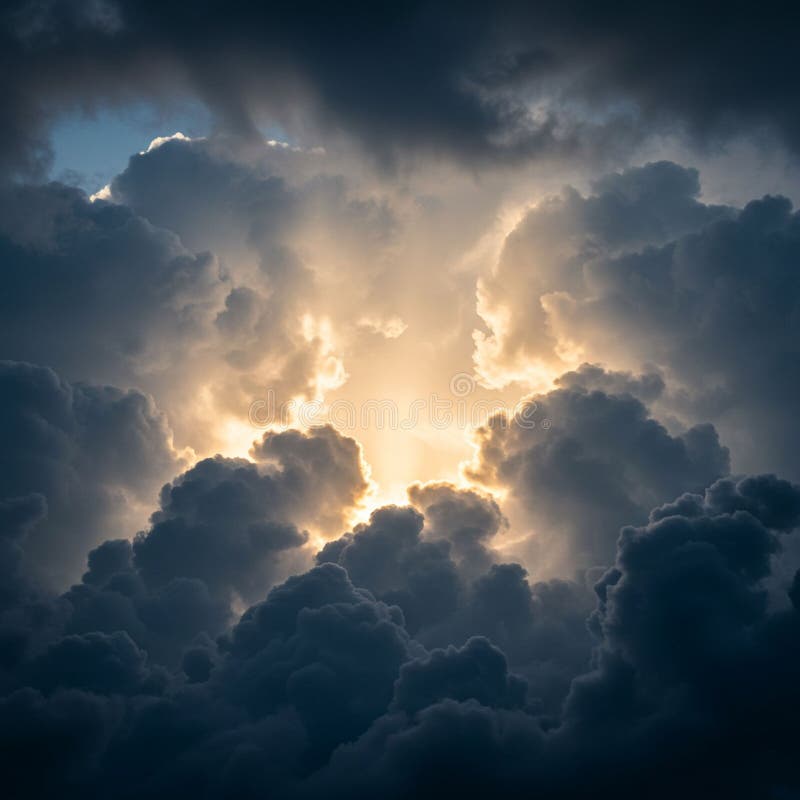 Dramatic Scene with Dark, Dense Clouds Partially Obscuring a Radiant ...
