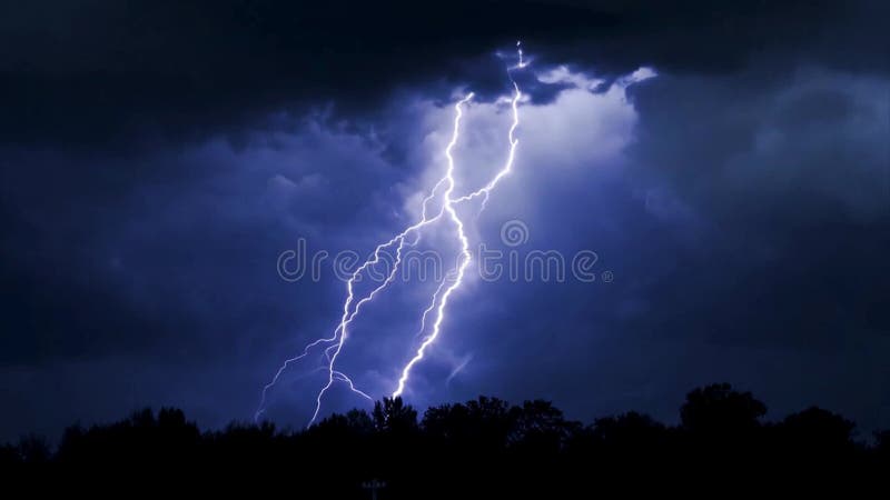 Dramatic Scene of Lightning, Thunderstorm Over the Forest Landscape at ...