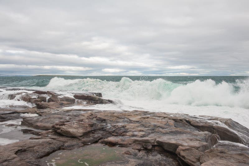 Dramatic Scene with Sea Waves Crashing on Big Rocks Stock Photo - Image ...