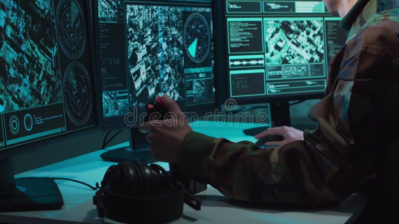 Military Soldier Operating Advanced Technology in a Command Center ...