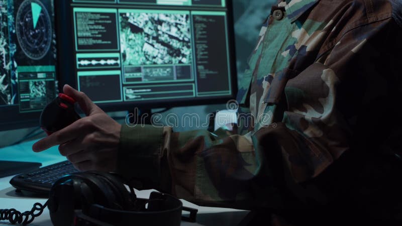 Military Soldier Operating Advanced Technology in a Command Center ...