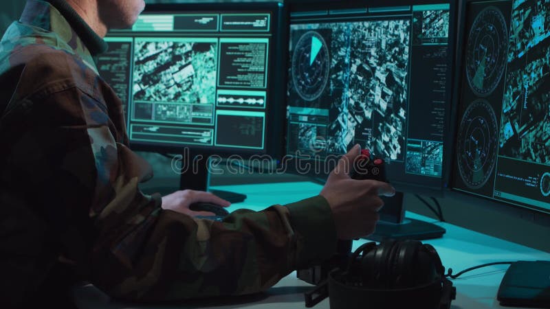 Military Soldier Operating Advanced Technology in a Command Center ...