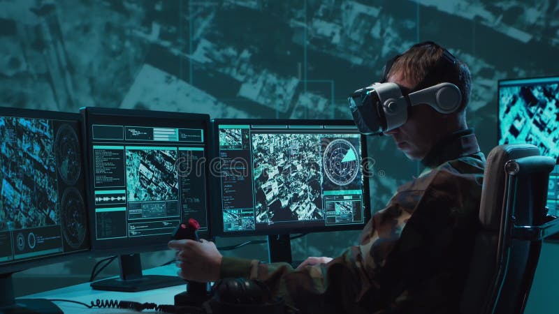 Military Soldier Operating Advanced Technology in a Command Center ...