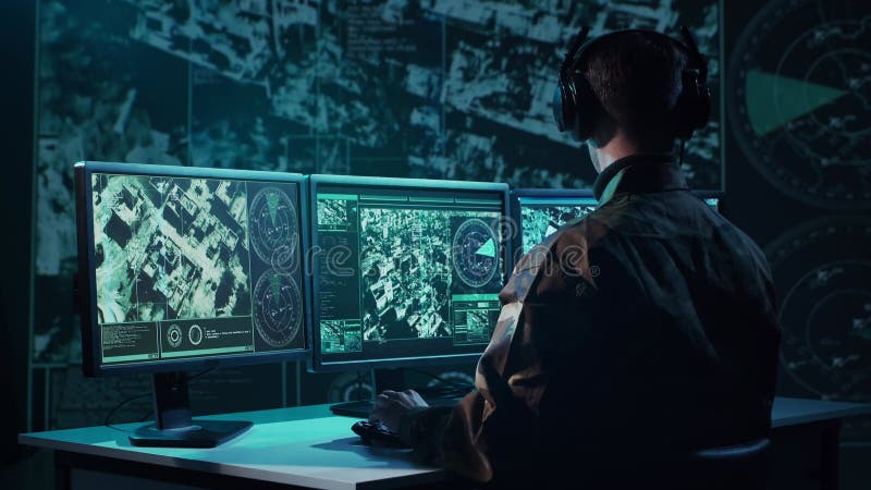Military Soldier Operating Advanced Technology in a Command Center ...