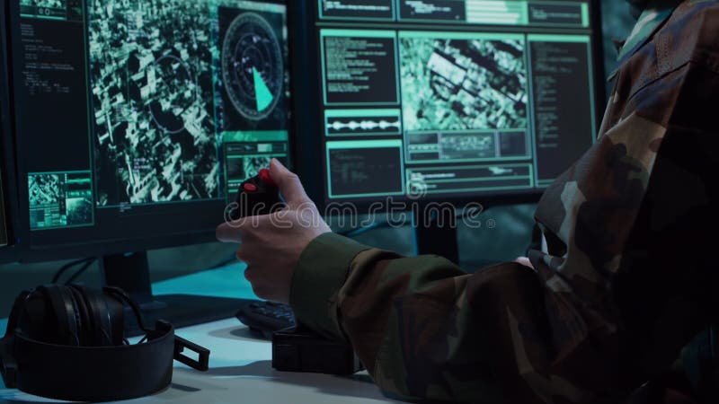 Military Soldier Operating Advanced Technology in a Command Center ...