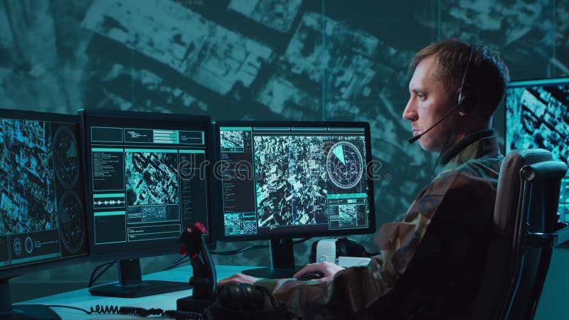 Military Soldier Operating Advanced Technology in a Command Center ...