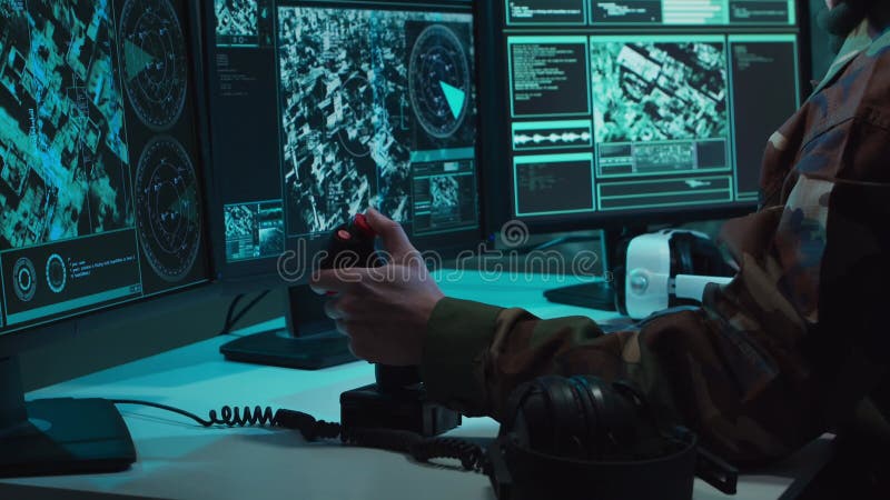 Military Soldier Operating Advanced Technology in a Command Center ...