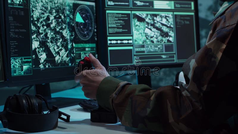 Military Soldier Operating Advanced Technology in a Command Center ...