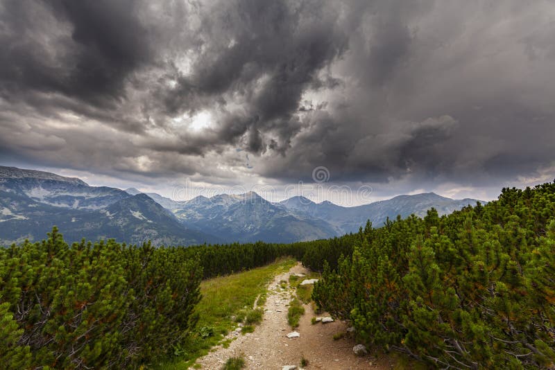 Dramatic Scenery in the Alps, with Stormy Cloudscape Stock Image ...