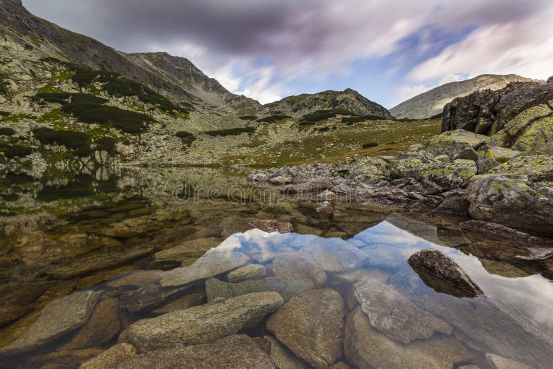 Dramatic Scenery in the Alps, with Stormy Cloudscape Stock Image ...