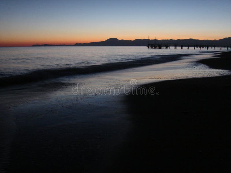 A Dramatic Scenery after Sun in a Seaside Stock Image - Image of sand ...