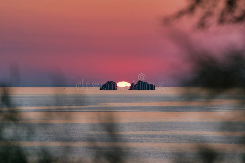 Dramatic Scenery of a Vibrant Sunset in the Sky Over the Ocean in the ...