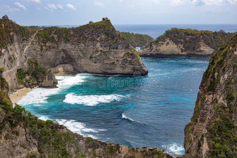 Scattered Rocky Islands and Towering Cliffs in the Deep Blue Ocean ...