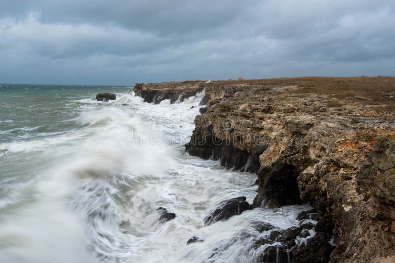 Dramatic Seascape with Rocks and Waves - Copy Space Stock Image - Image ...
