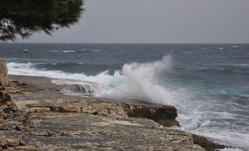 Dramatic Seascape. Storm in the Ocean, Big Waves Hitting the Rocks. Big ...