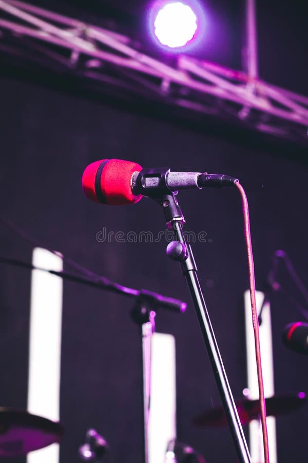 Dramatic Shot of a Microphone on a Stand Stock Image - Image of purple ...