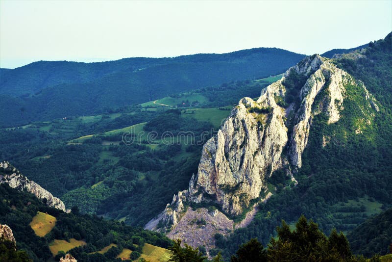 Dramatic Shot of a White Peak Above the Forests Stock Image - Image of ...