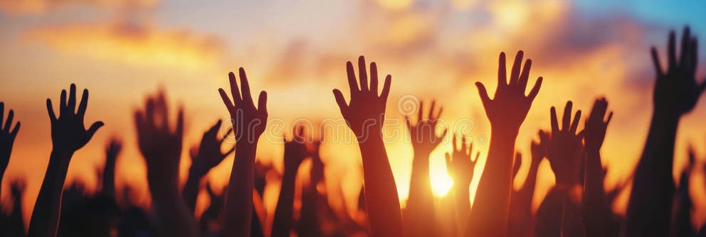 Dramatic Silhouette of a Diverse Crowd Raising Hands in Unity during a ...