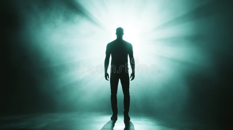 Dramatic Silhouette of a Man Against Bright Light, Casting an Elongated ...