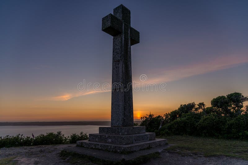 Beautiful Sunset Behind the Stone Cross at Dodman Point, Cornwall Stock ...