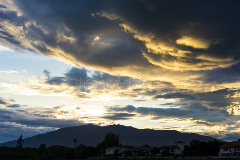 Dramatic Sky with Dark Clouds Above the Mountain at Sunset. Stock Photo ...