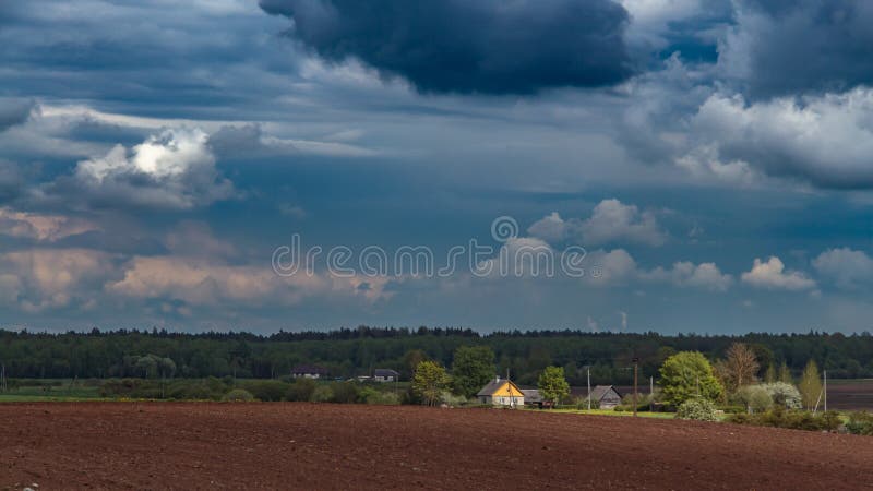 Dramatic Sky with Dark Clouds Over a Field Stock Photo - Image of ...