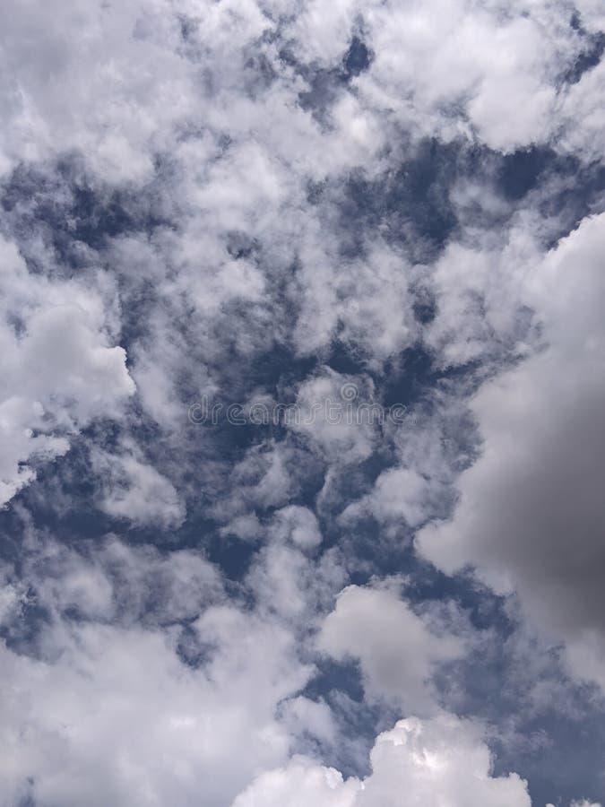 Dramatic Sky Full of Fluffy White and Grey Clouds Stock Image - Image ...