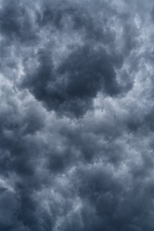 A Dramatic Sky, Full of Grey Cumulus Clouds. Background. Stock Image ...