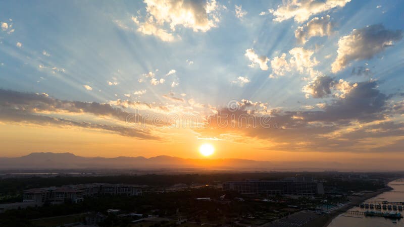 Dramatic Sky Illuminated by the Rising Sun Over a Beautiful Sea Coast ...