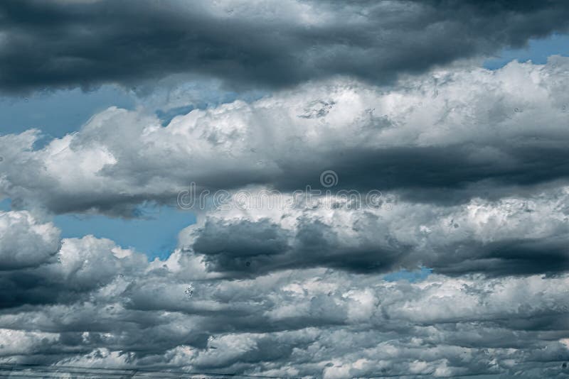A Dramatic Sky Looms Overhead in Summertime Stock Image - Image of dark ...