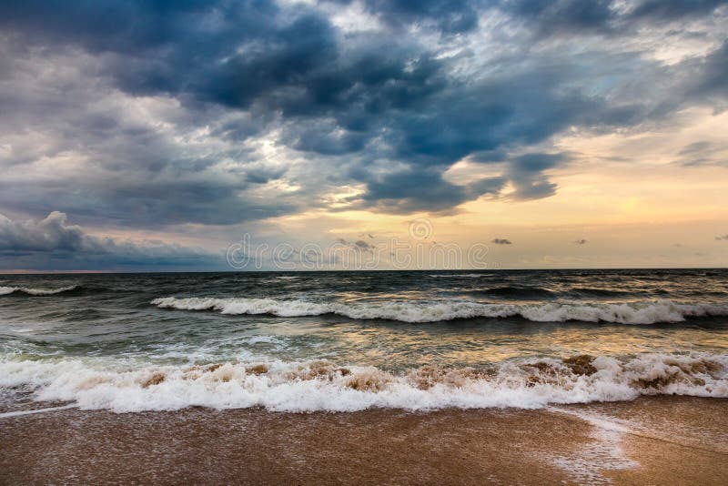 Dramatic Sky on a Morning Seascape. Sunrise on a Sandy Beach. Stock ...