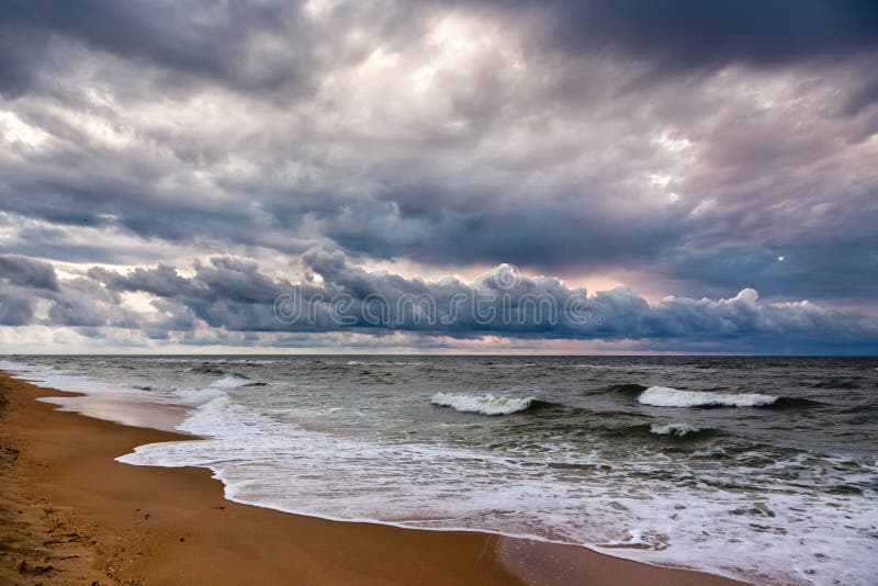 Dramatic Sky on a Morning Seascape. Sunrise on a Sandy Beach. Stock ...